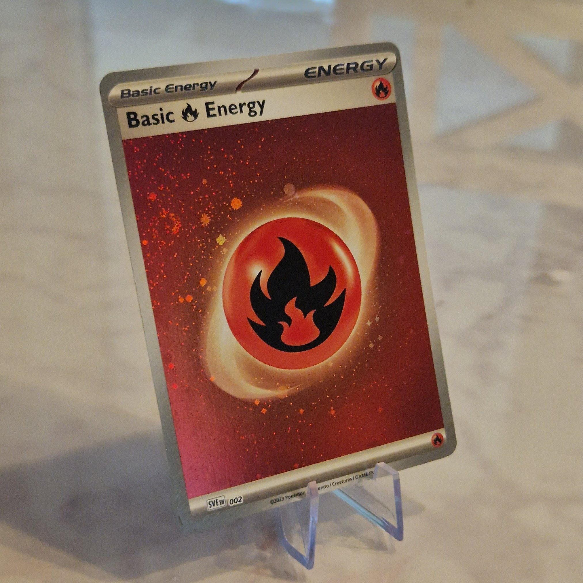 Pokemon Basic Fire Energy SVE en 002 Holo Swirl.. | Köp på Tradera (684870442)