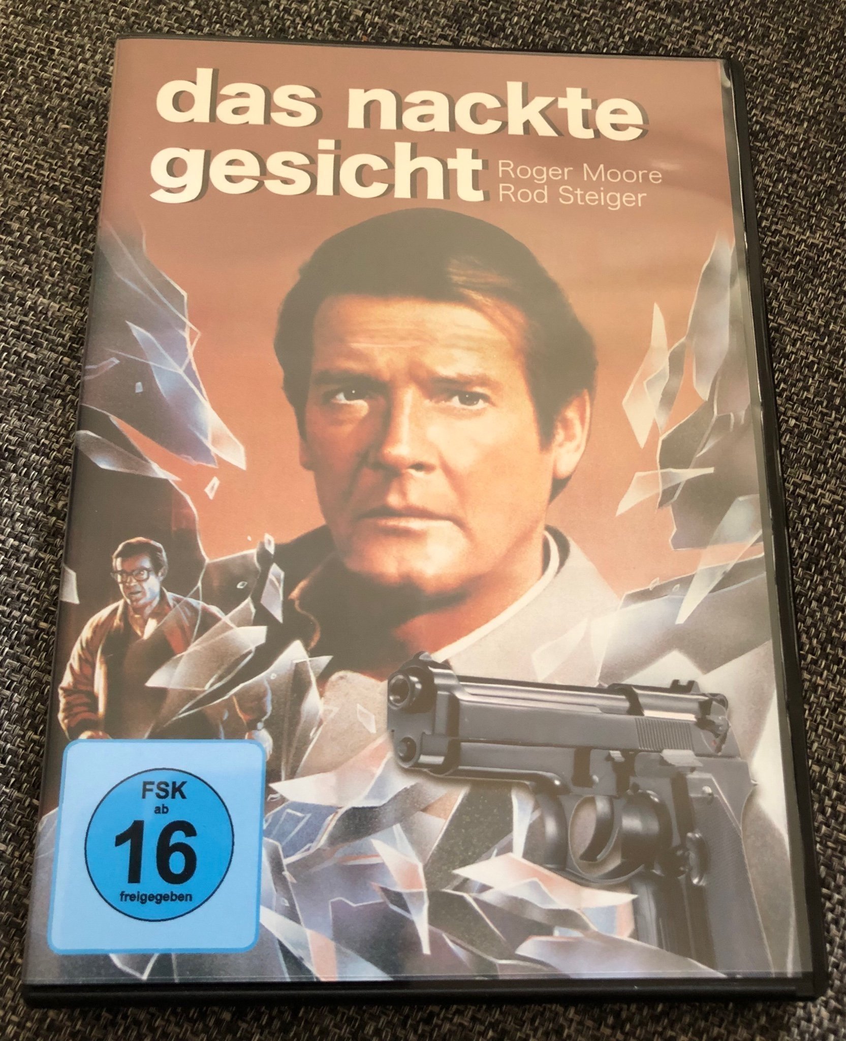 The Naked Face (1984) Roger Moore / Rod Steiger.. | Köp på Tradera ...