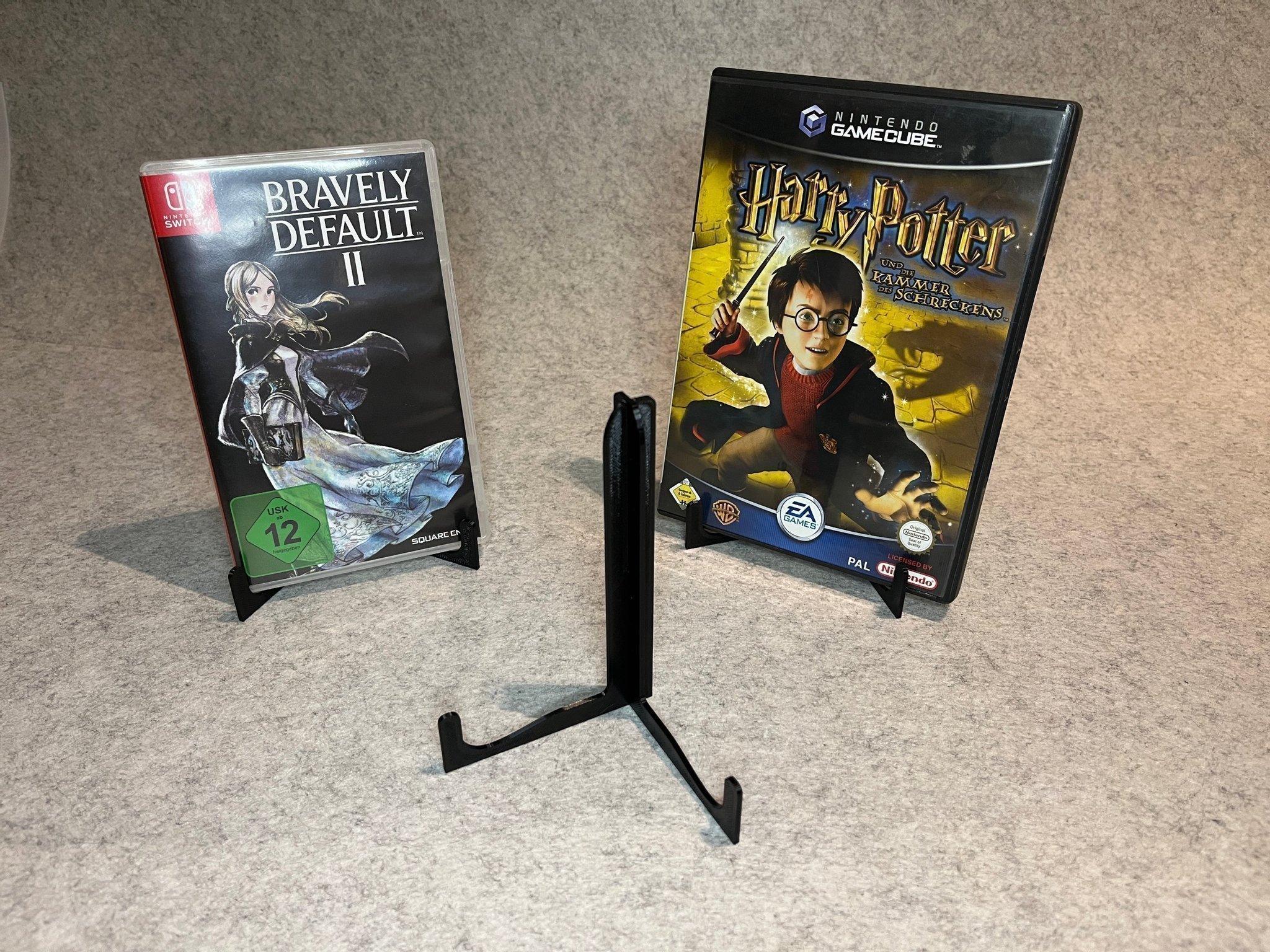 10st display ställ för spel eller DVD | Köp på Tradera (710820386)