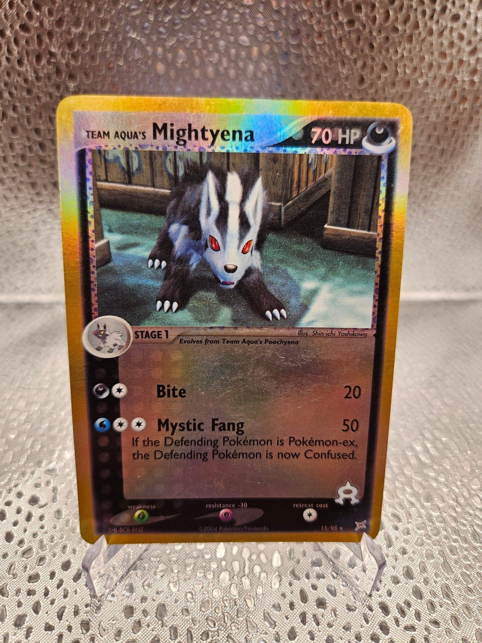 Se produkter som liknar Mightyena [Reverse Holo] #15 .. på Tradera ...