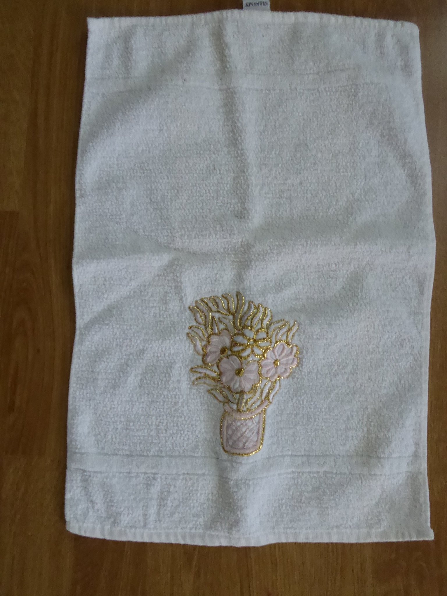 Se produkter som liknar Vit liten frotté handduk med .. på Tradera ...