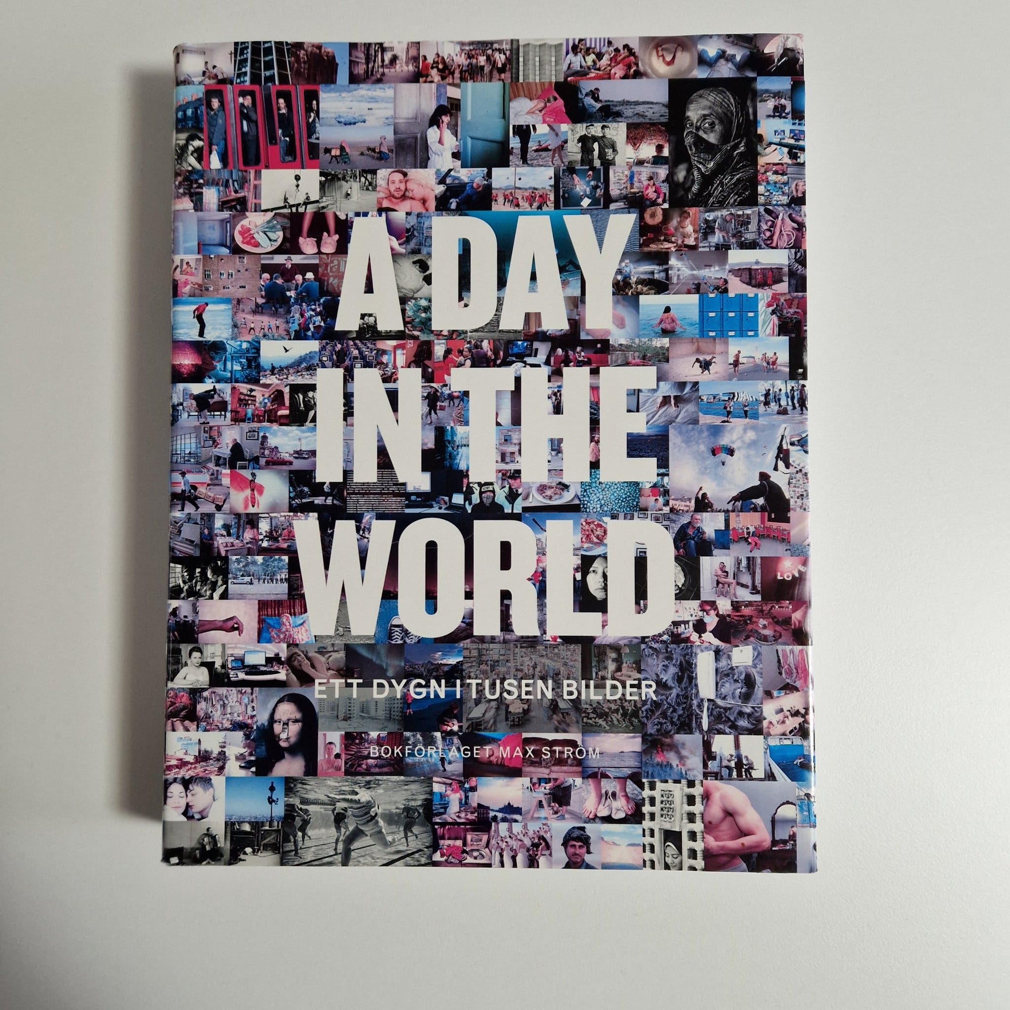 A Day in the World: Ett dygn i tusen bilder | Köp på Tradera (659096955)