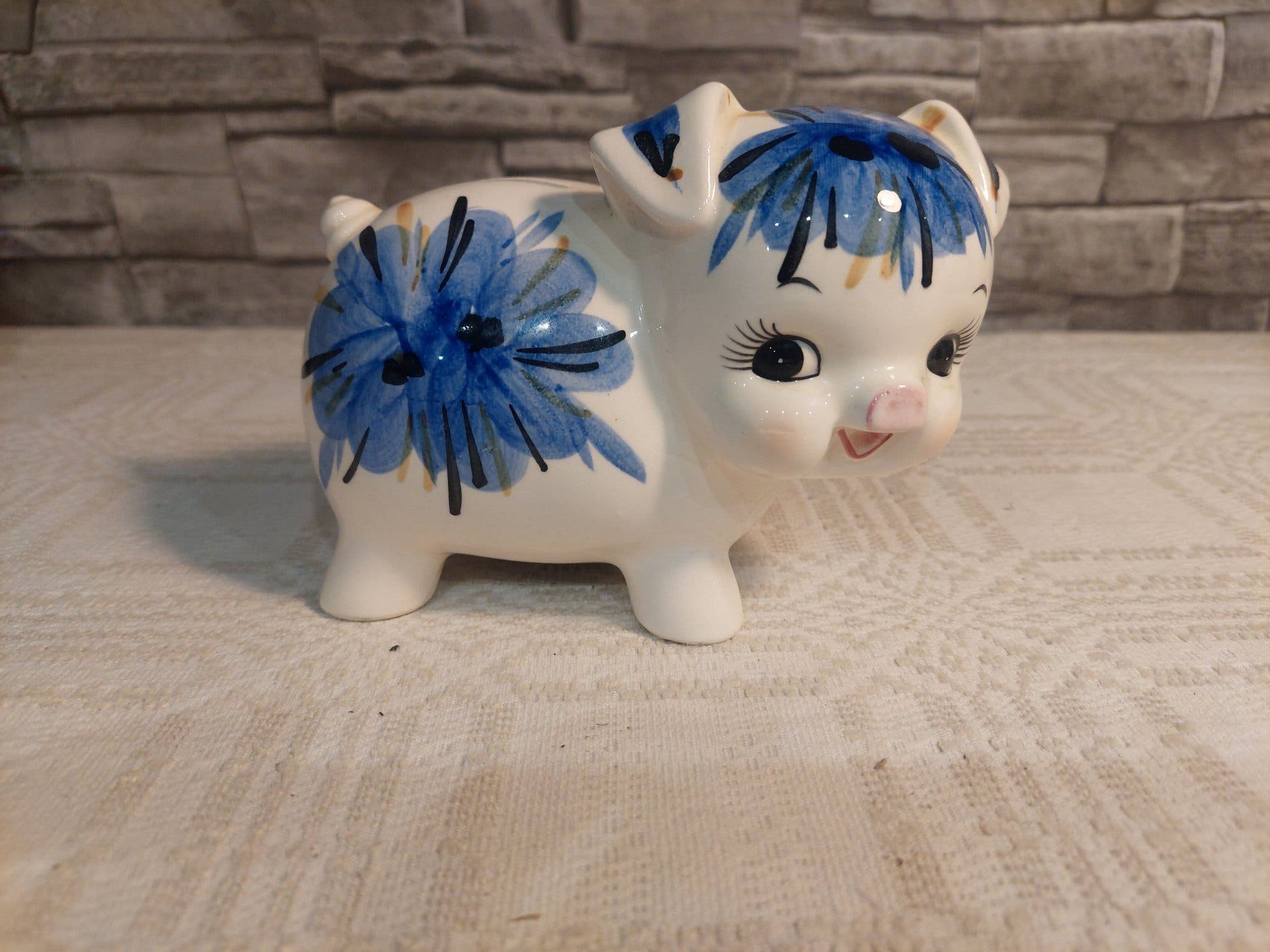 Se produkter som liknar Charmig blommig spargris vint.. på Tradera ...