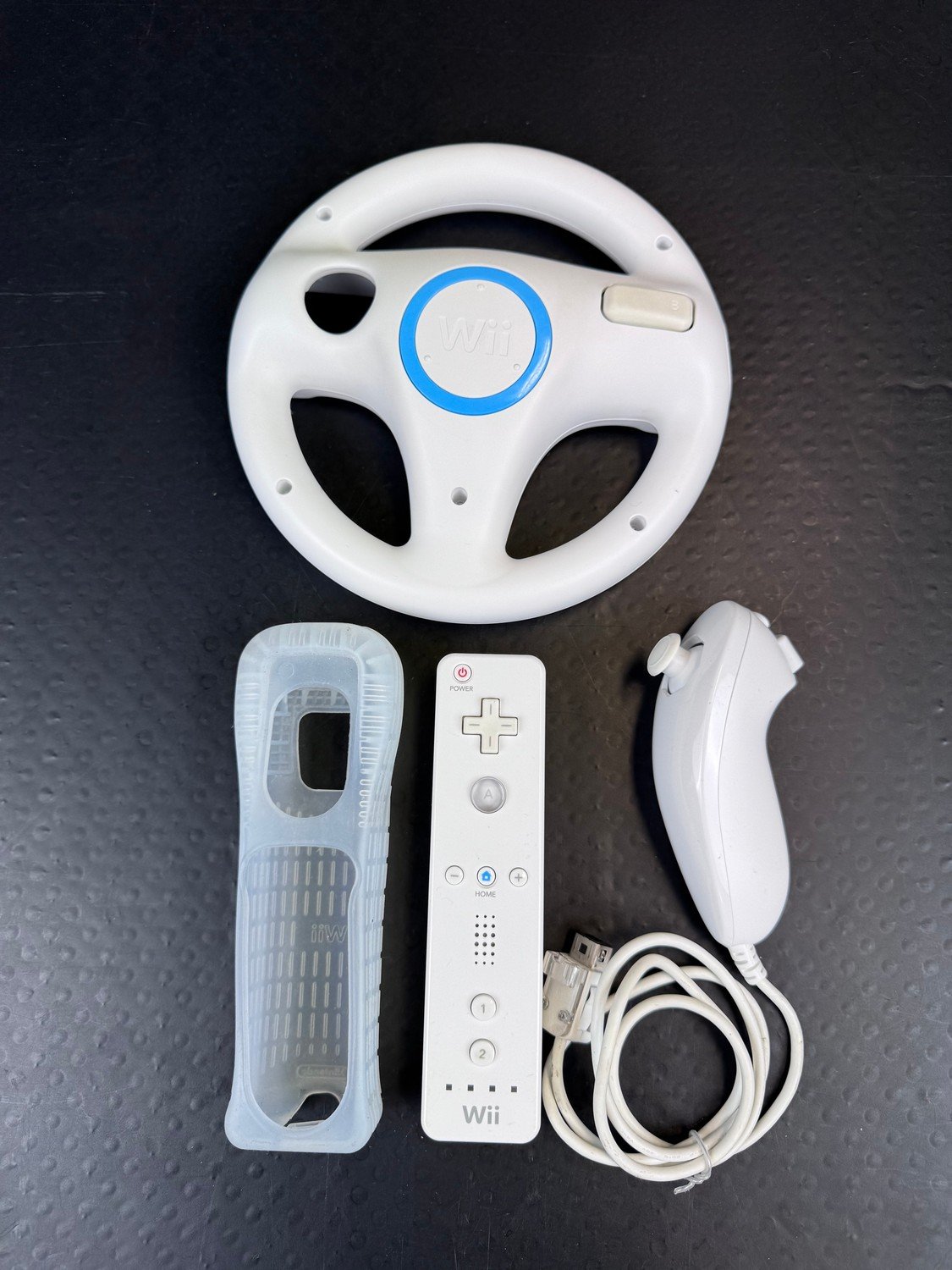 Se produkter som liknar Nintendo Wii ratt, handkontro.. på Tradera ...