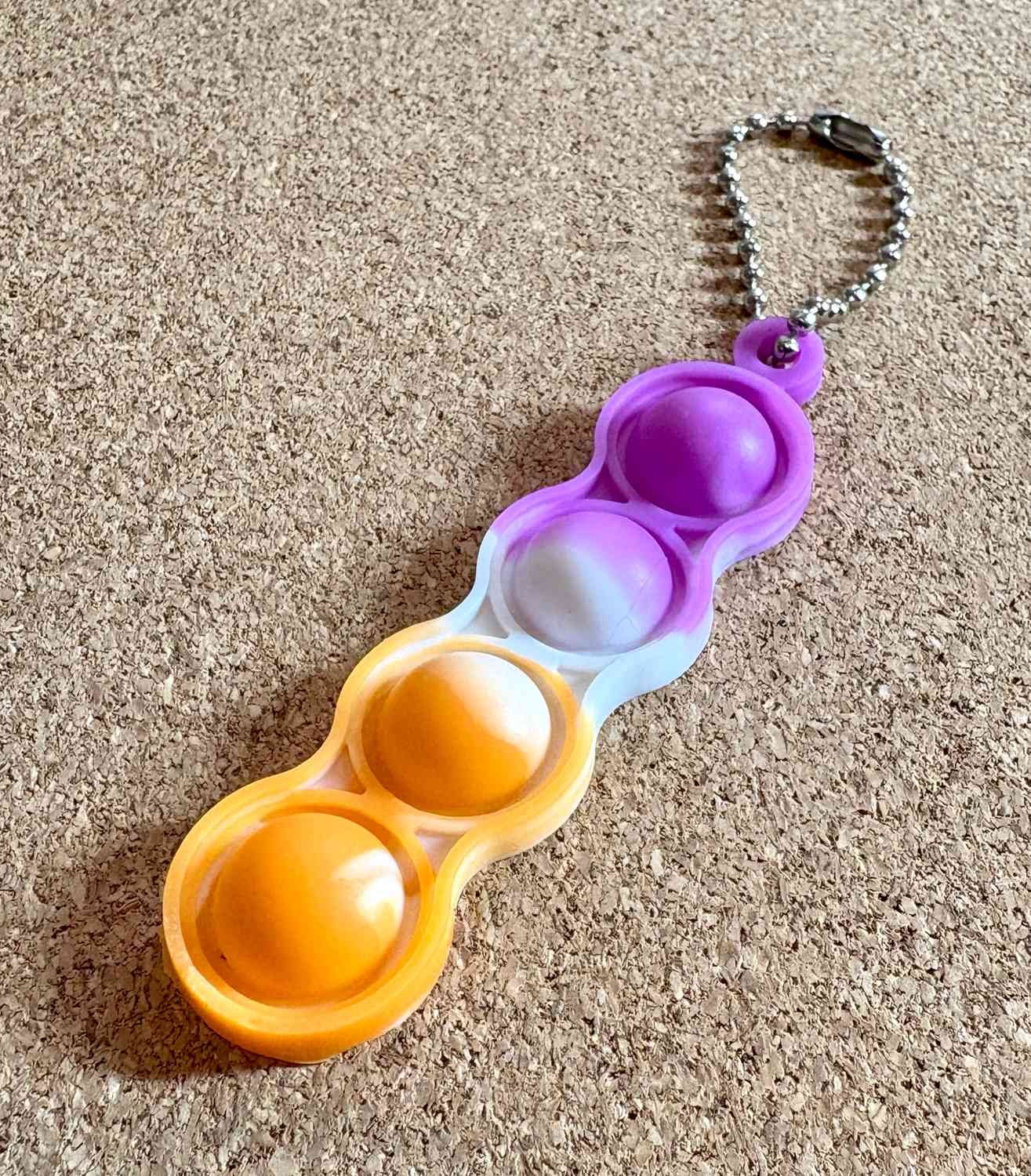 ORANGE LILA VIT fyra Pop It Fidget Toy nyckelri.. | Köp på Tradera ...
