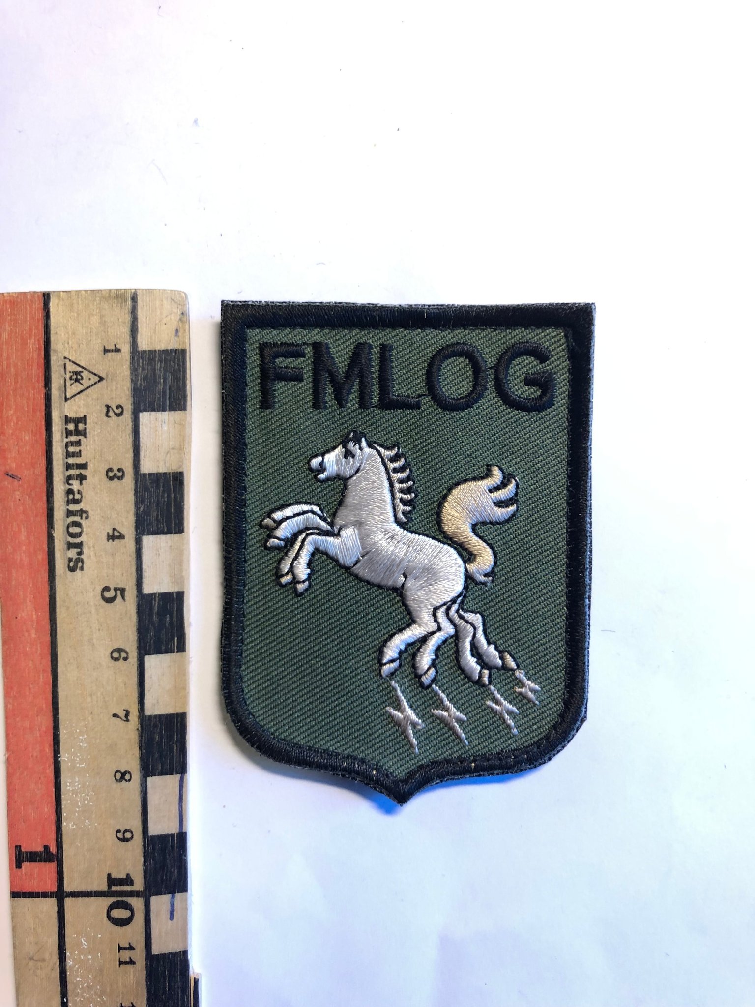 FMLOG Försvarsmaktens Logistik Tygmärke Kardborre | Köp på Tradera (610703048)