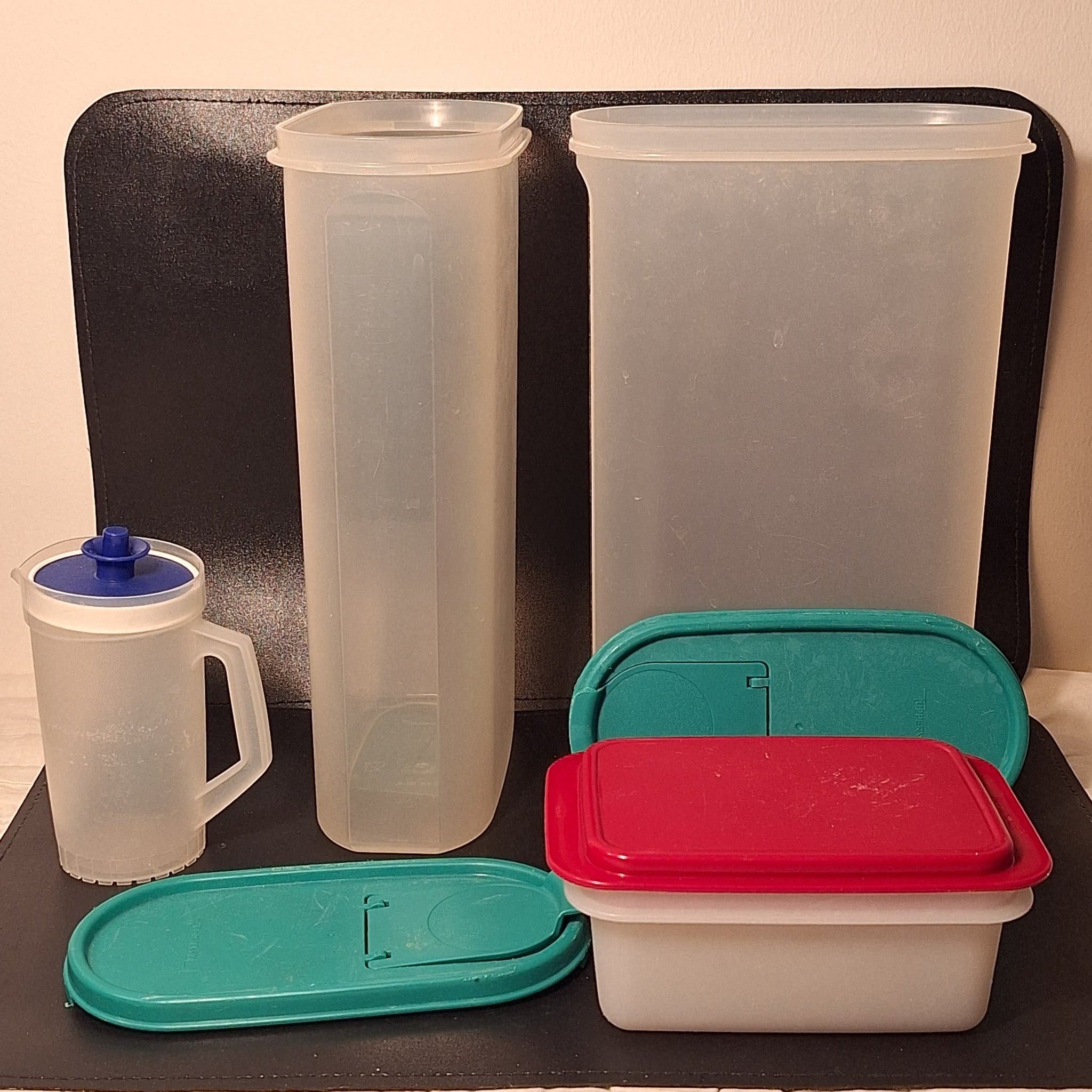 Se produkter som liknar Fyra Tupperware - mjölkkanna,.. på Tradera ...