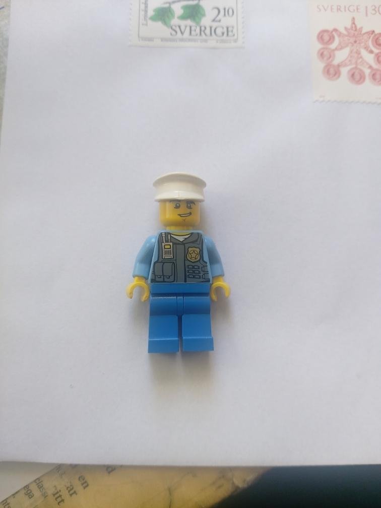 lego figur gubbe polis logga rygg | Köp på Tradera (556655450)