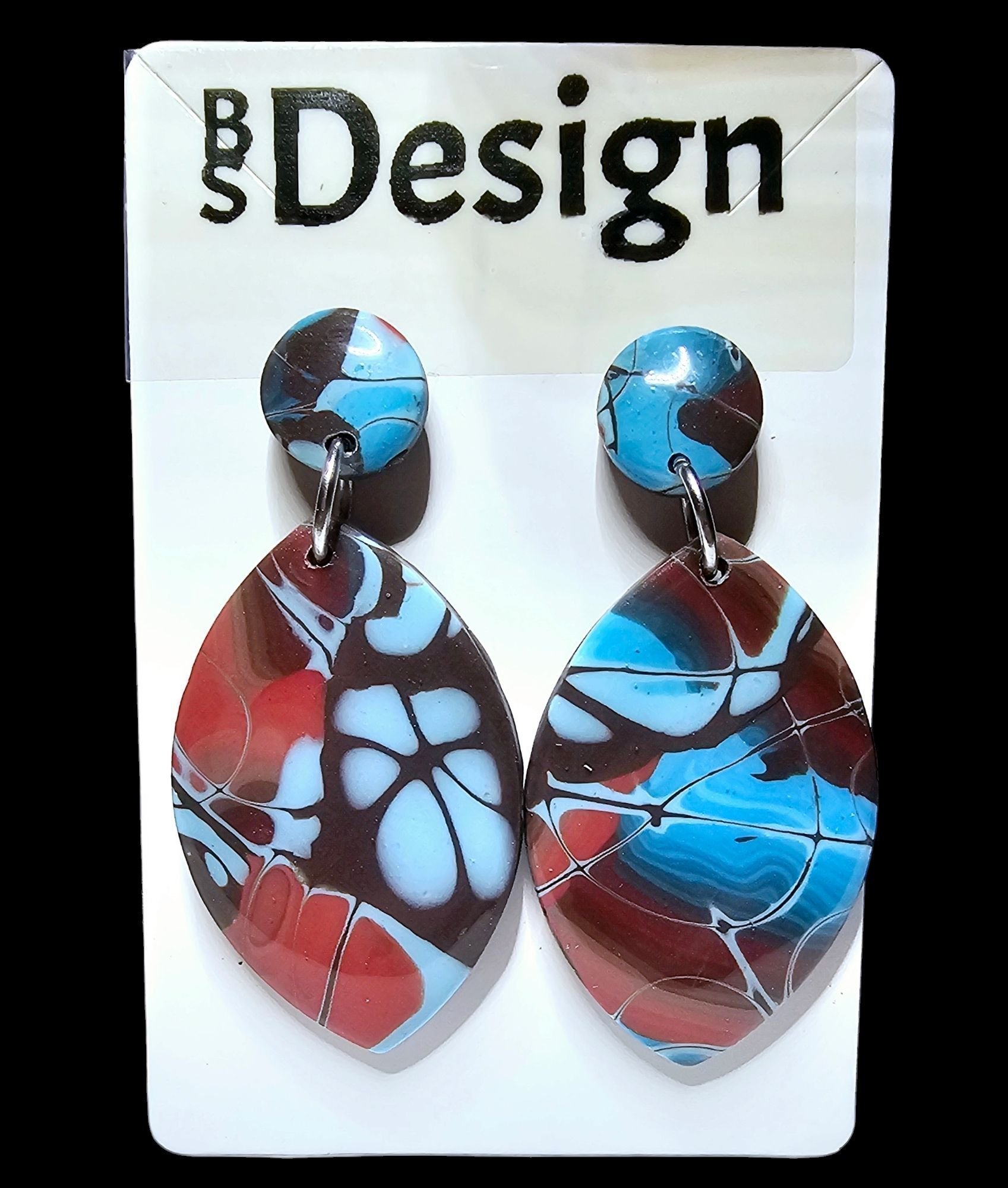 Örhängen i polymerlera med stift av kirurgisk s.. | Köp på Tradera ...