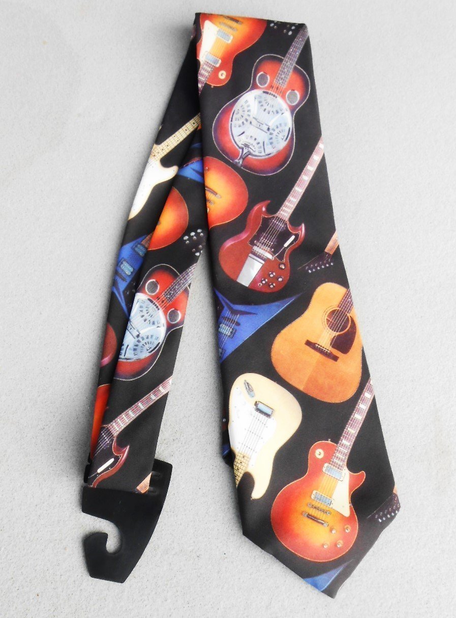Slips Ralph Marlin med mönster av olika elgitar.. | Köp på Tradera ...
