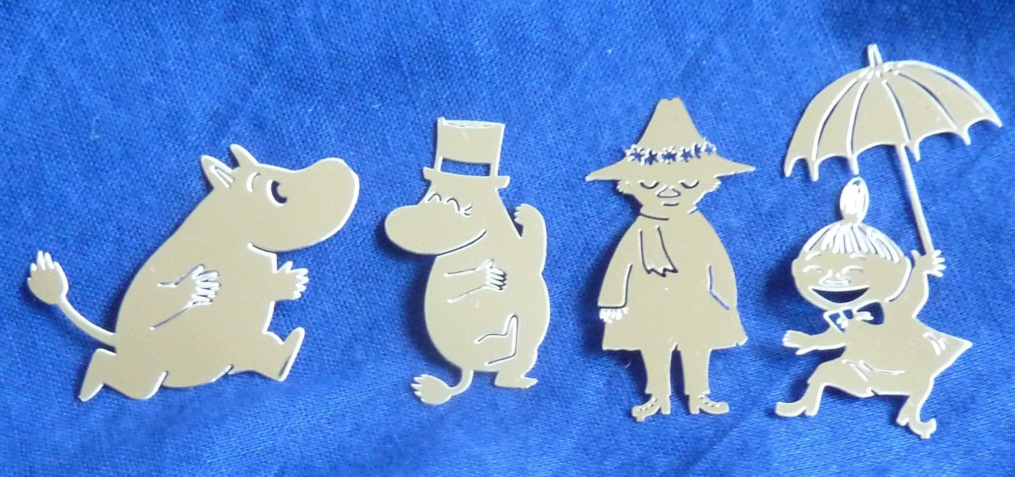 4 Mumin- Mumindalens figurer/Siluetter i silver.. | Köp på Tradera ...