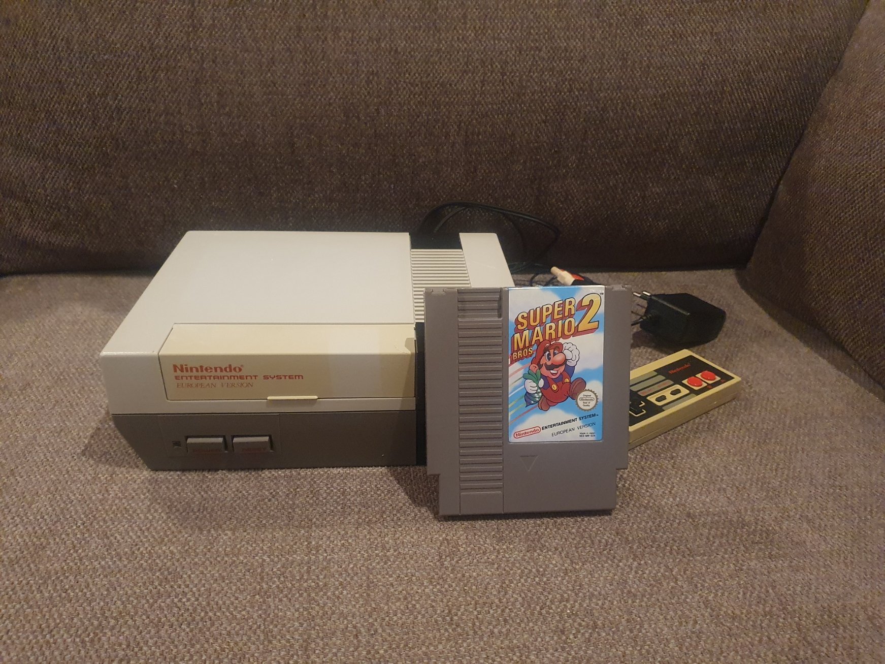 Se produkter som liknar Nintendo 8bit NES med Super M.. på Tradera ...