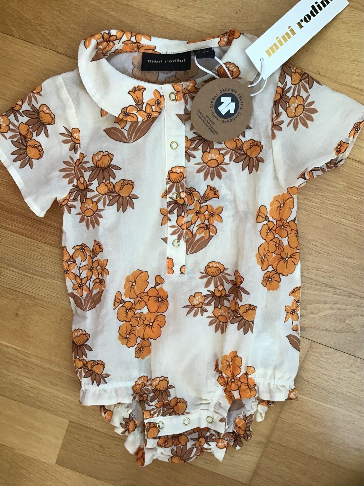 Se produkter som liknar Mini Rodini 80 ny beige body,.. på Tradera ...