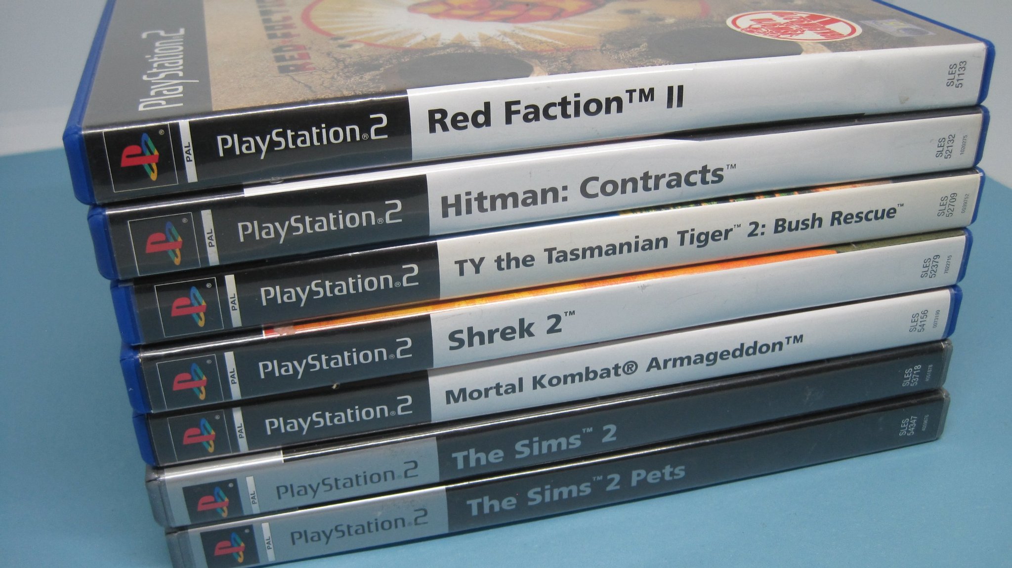 Se produkter som liknar PS2 Games x 7 Sims Red Factio.. på Tradera ...