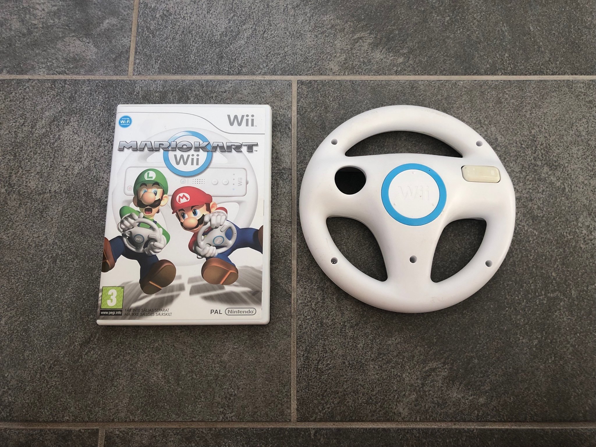 Se produkter som liknar Mario Kart Wii med ratt - Ori.. på Tradera ...