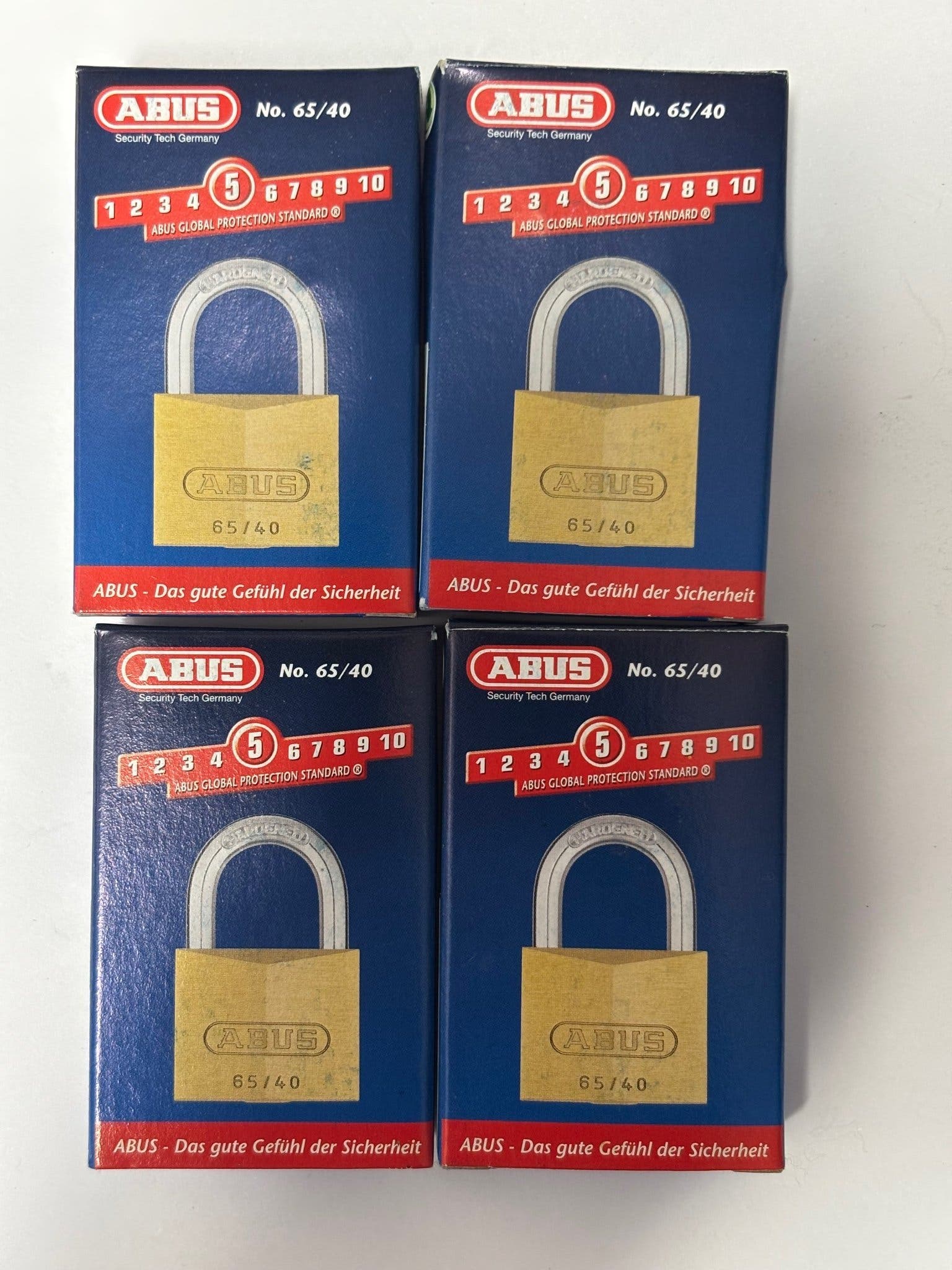 ABUS Compact 65/40 Hänglås , 4 Styck med lika lås | Köp på Tradera ...