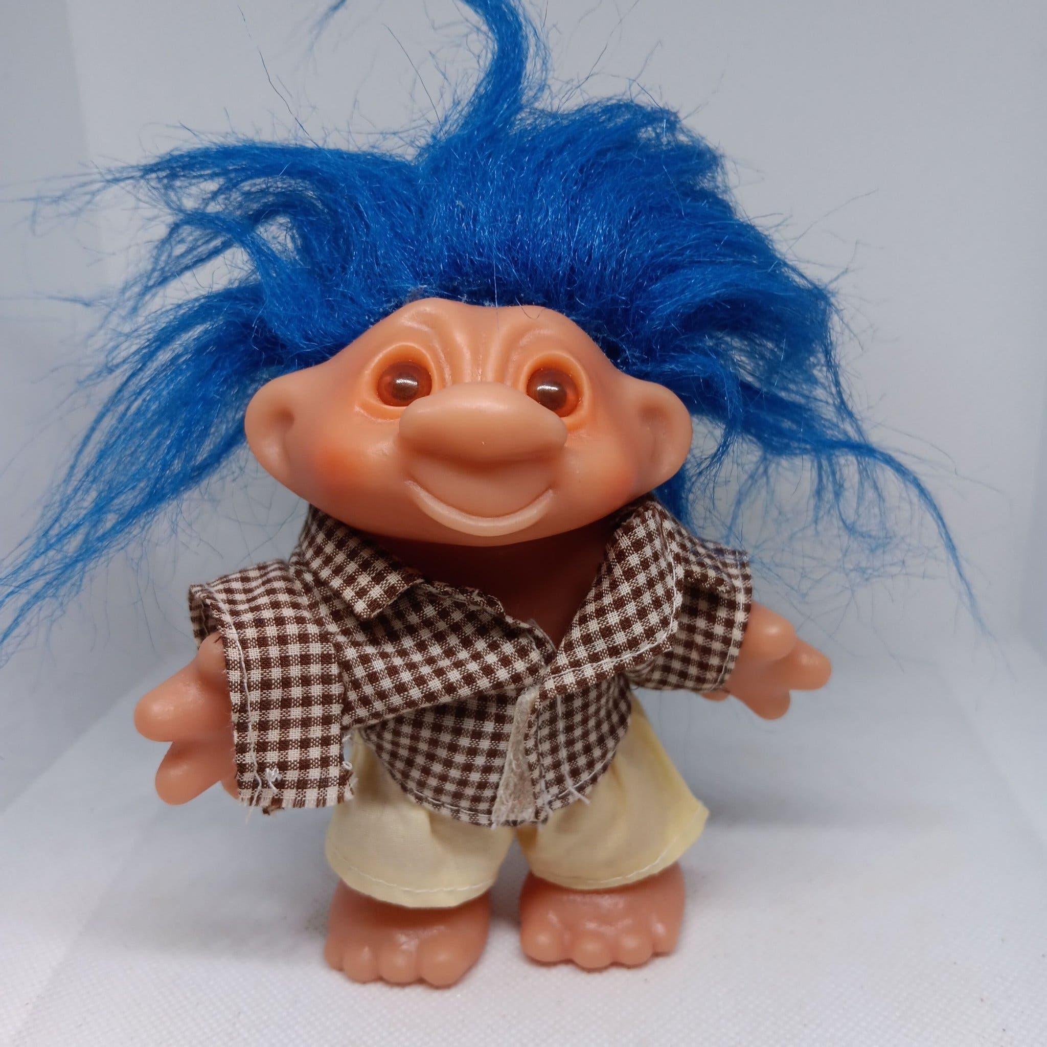 Se produkter som liknar DAM Troll 1986 blått yvigt hå.. på Tradera ...