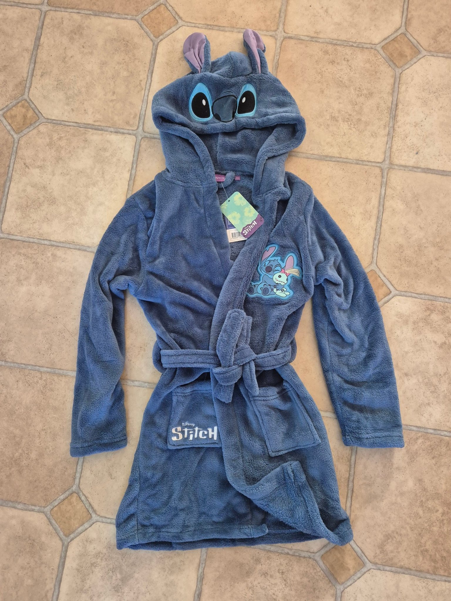 Se produkter som liknar Disney Stitch blå morgonrock,.. på Tradera ...