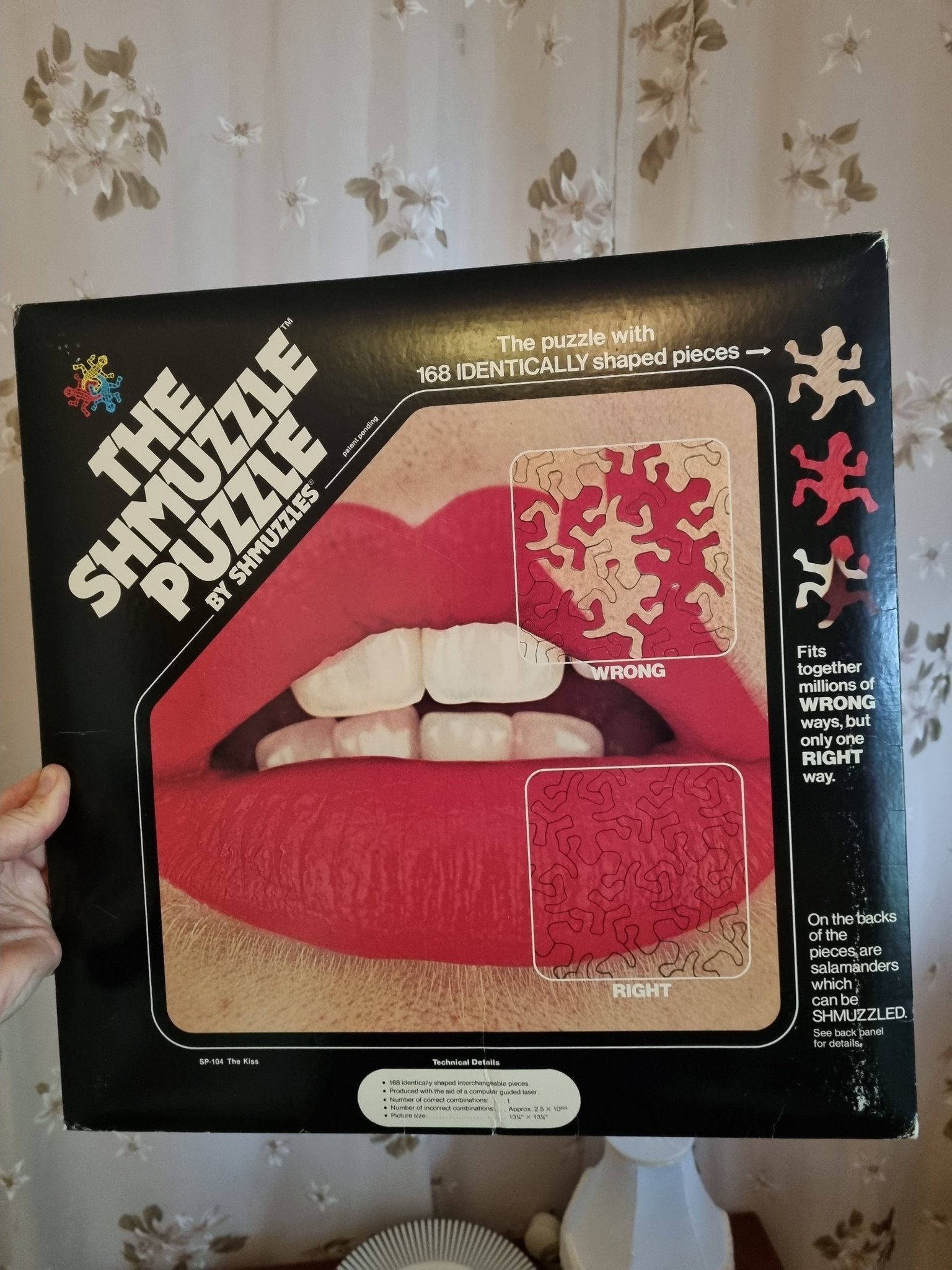 Se produkter som liknar The Shmuzzle Puzzle, the kiss.. på Tradera ...