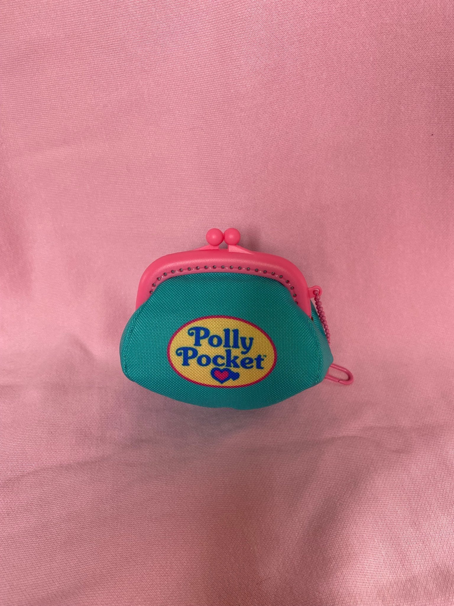 Se produkter som liknar Super rare Polly Pocket merch.. på Tradera ...