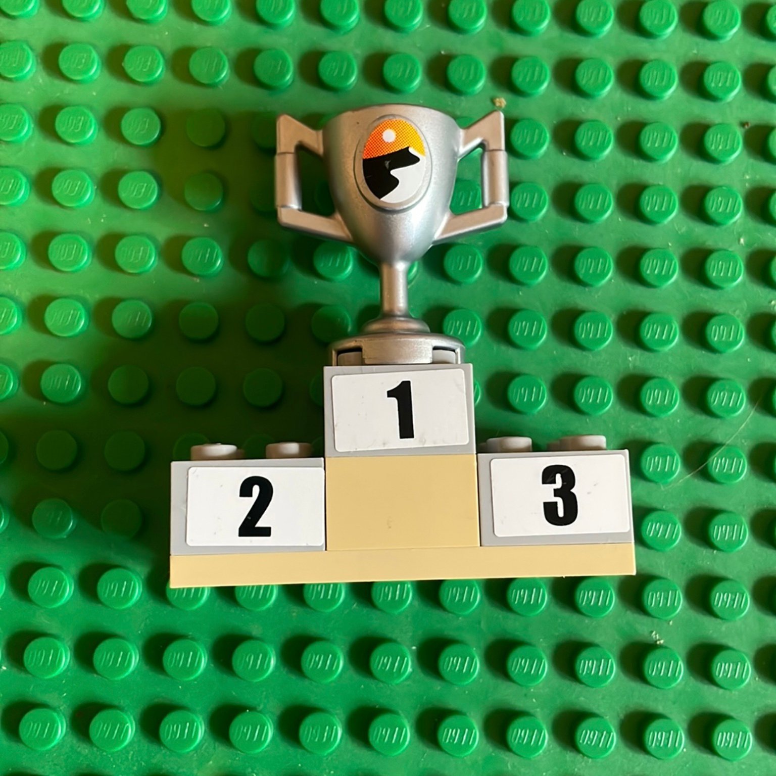 Se produkter som liknar Lego podium, buckla, trofé på Tradera (630268441)