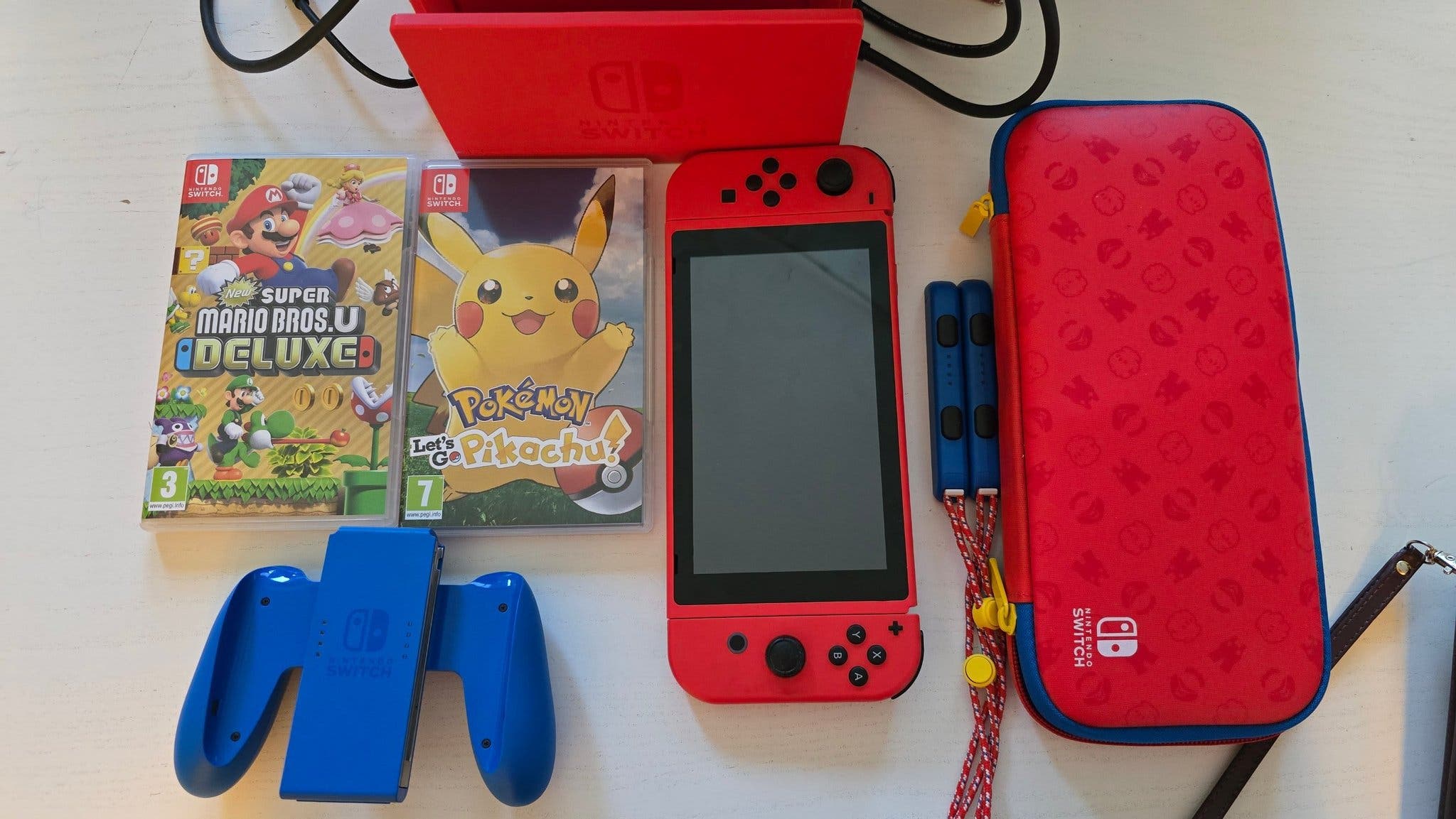 Nintendo Switch Mario Red & Blue Edition med spel | Köp på Tradera ...
