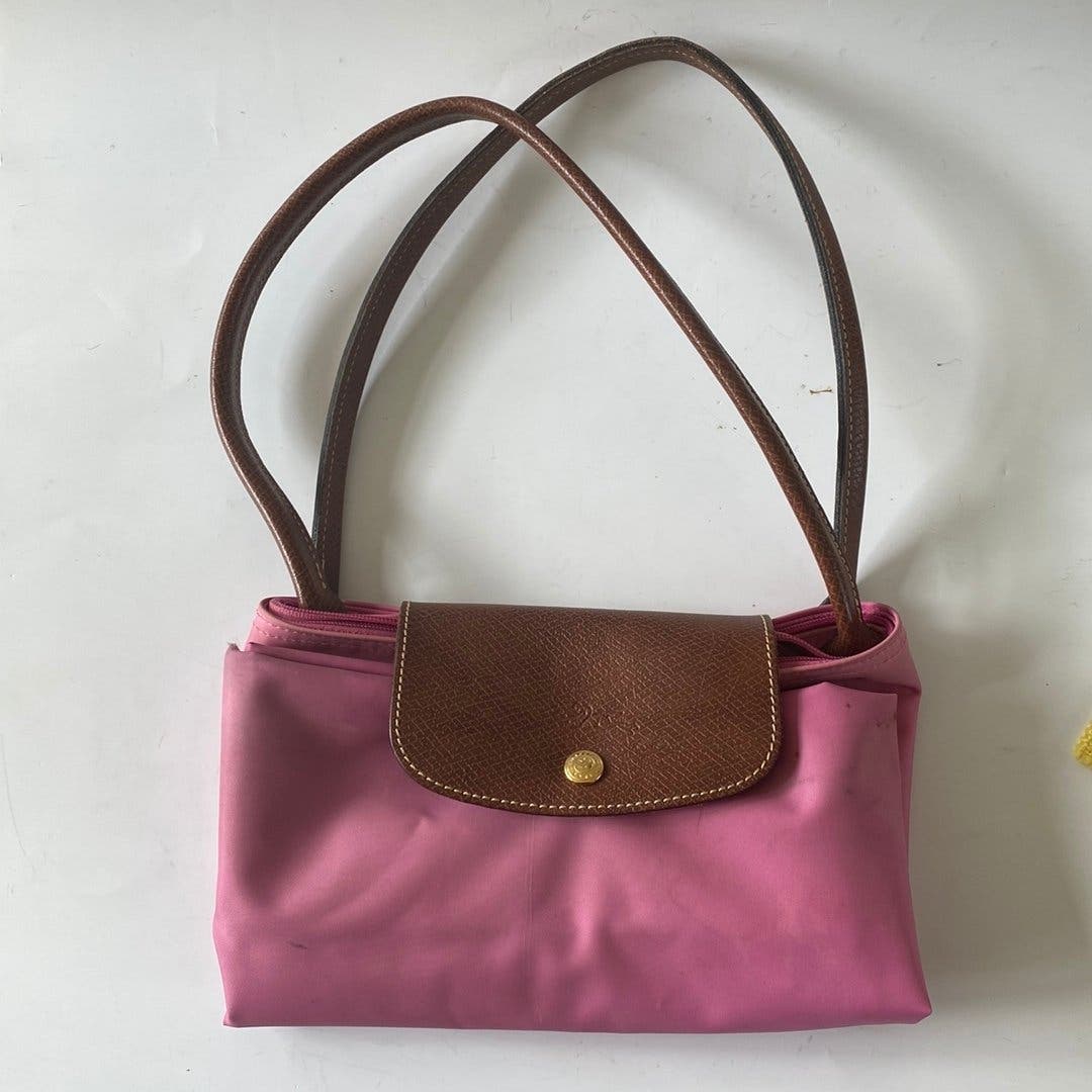 Se produkter som liknar Longchamp rosa väska på Tradera (694378344)
