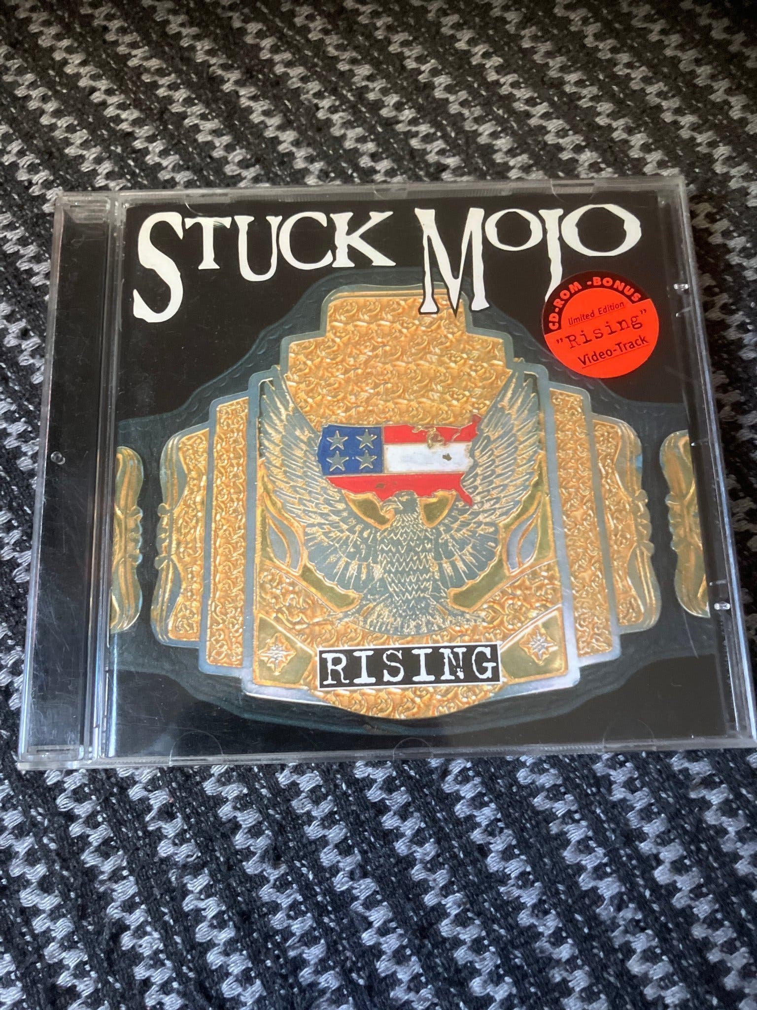 Se produkter som liknar Stuck Mojo - Rising CD Album på Tradera (703694364)