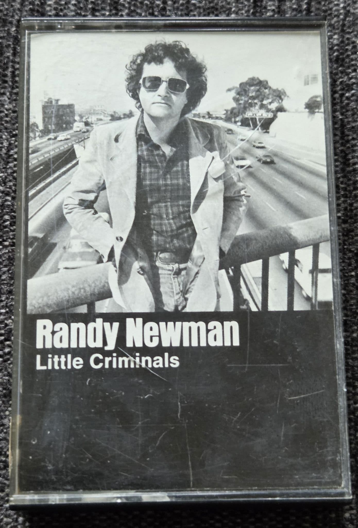 Se produkter som liknar randy newman "little criminal.. på Tradera ...