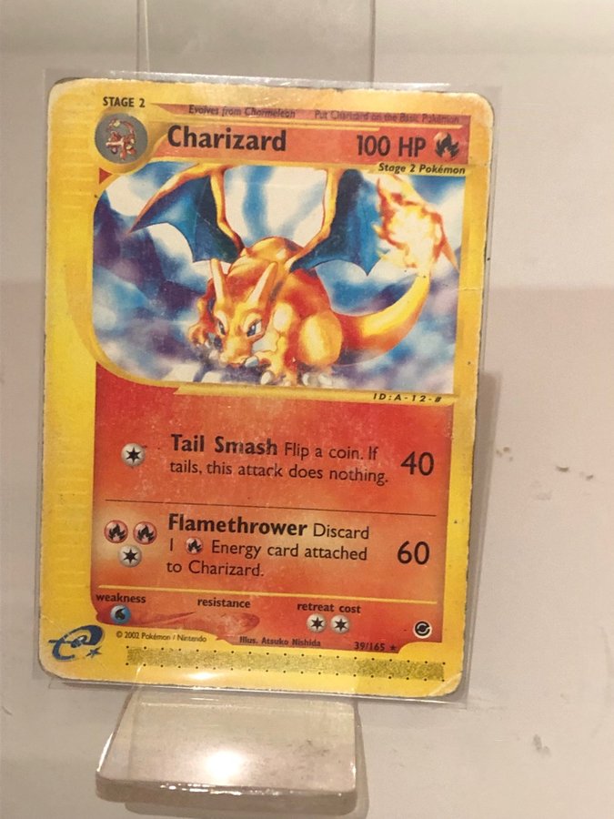 Se produkter som liknar Charizard Pokémonkort 39/165 på Tradera (712392252)