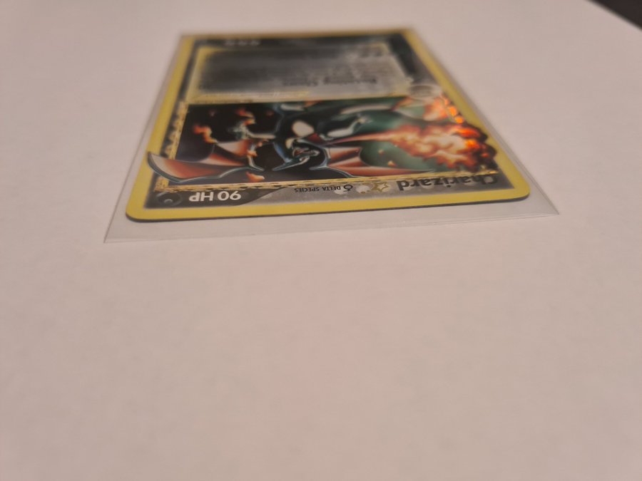 Se produkter som liknar Charizard gold star #100 på Tradera (691374349)