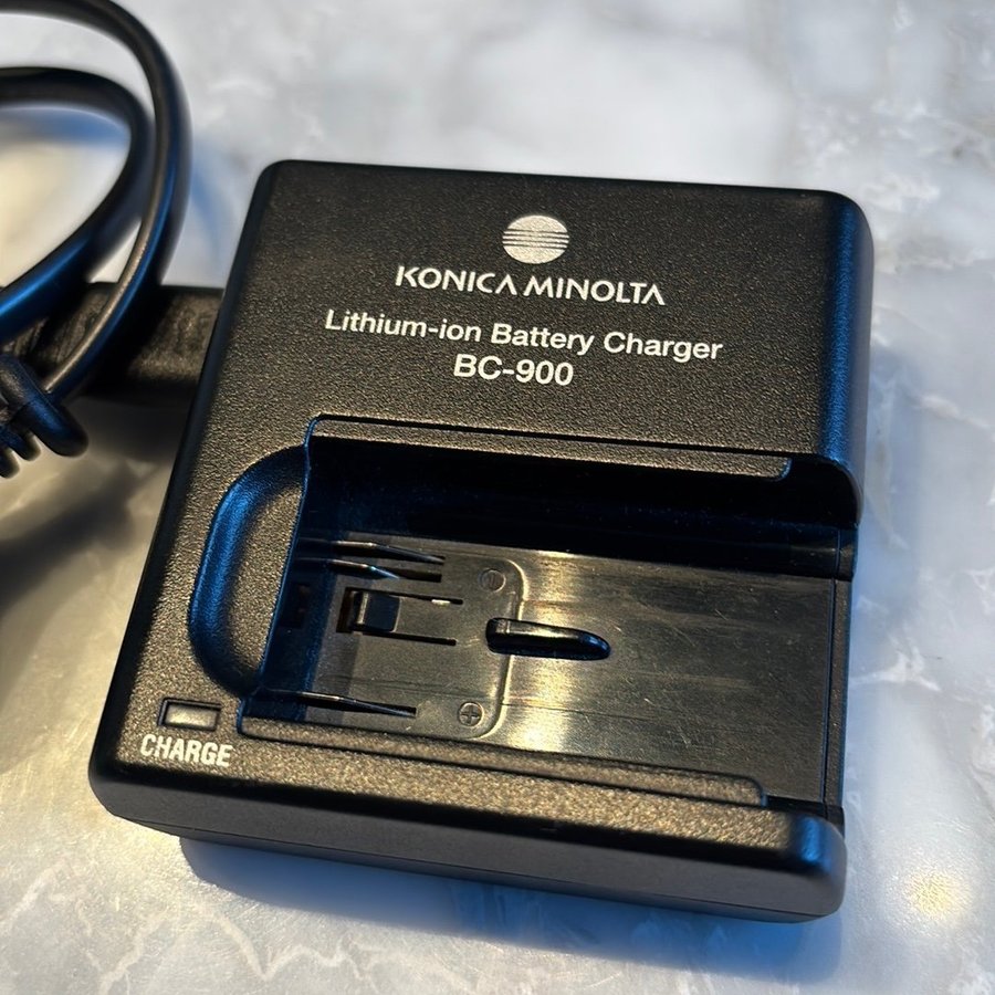 Konica Minolta BC-900 Batteriladdare | Köp på Tradera (707456500)