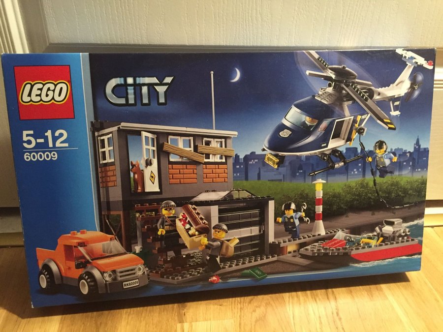 Se produkter som liknar Lego 60009 City med kartong, .. på Tradera ...