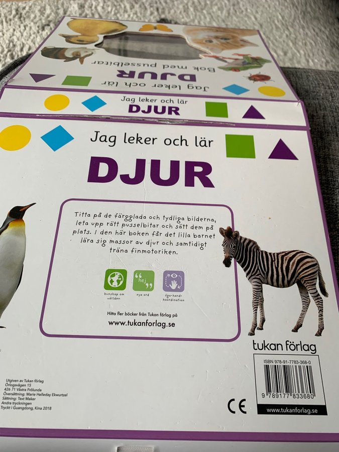 Bok med pusselbitar / djur