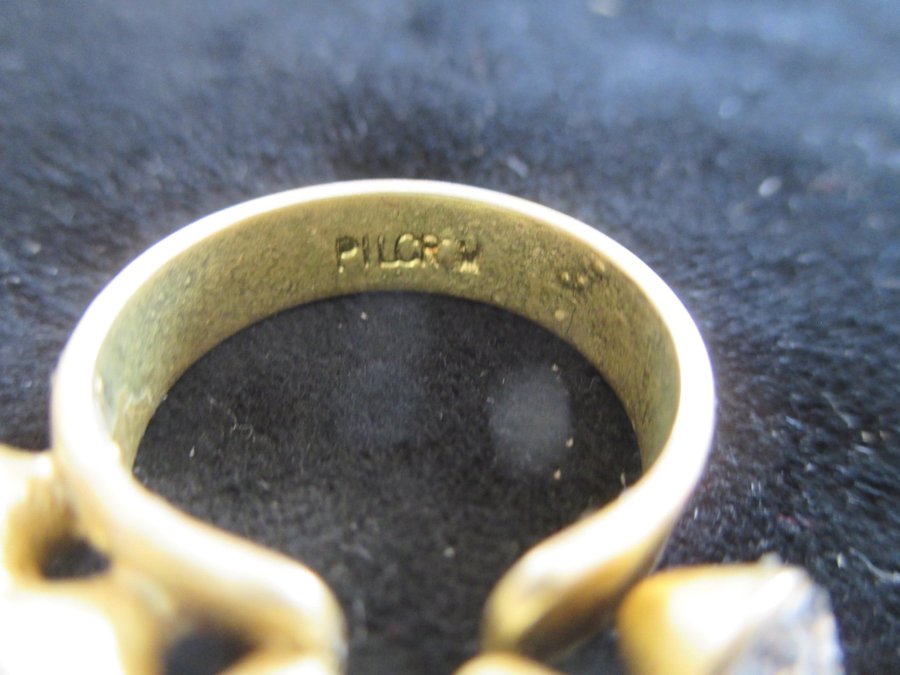 Pilgrim 1990-Tal, Guldfärgad Ring med 5 klara K.. | Köp på Tradera ...