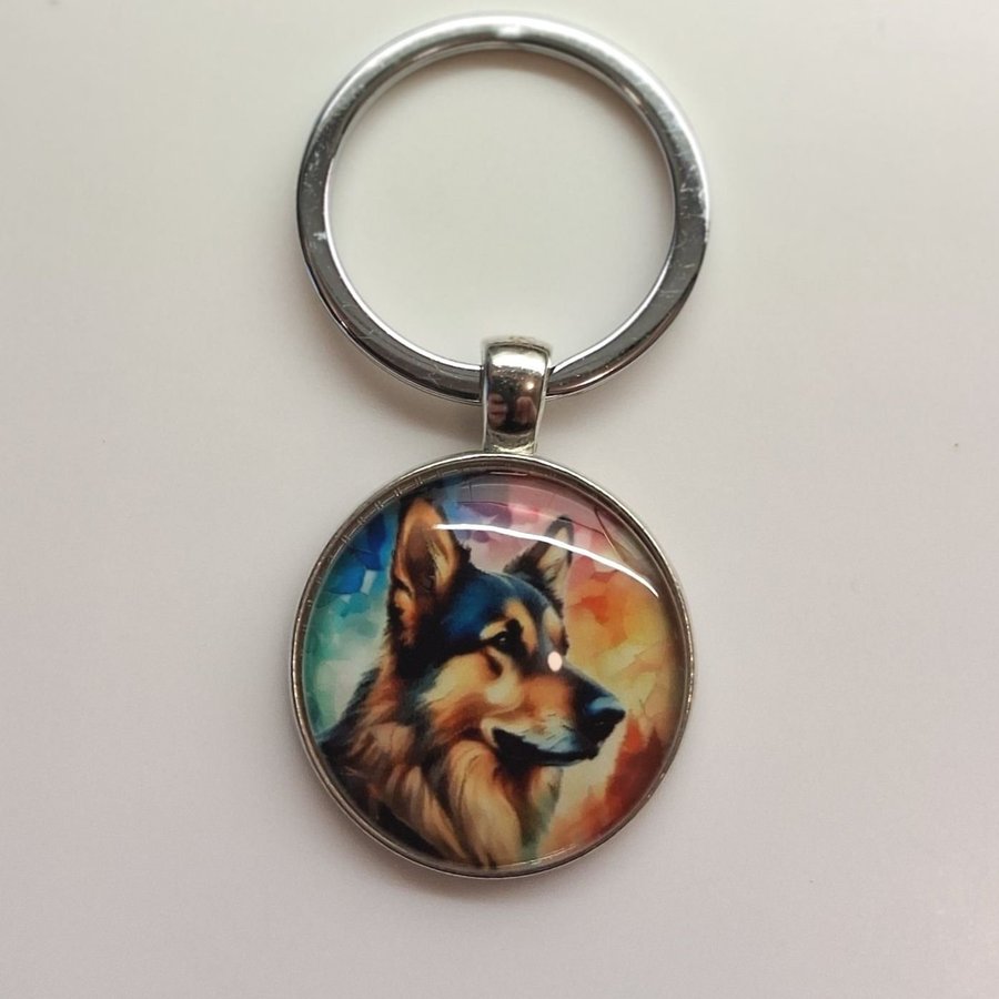 En silverfärgad nyckelring i metall och glas me.. | Köp på Tradera ...